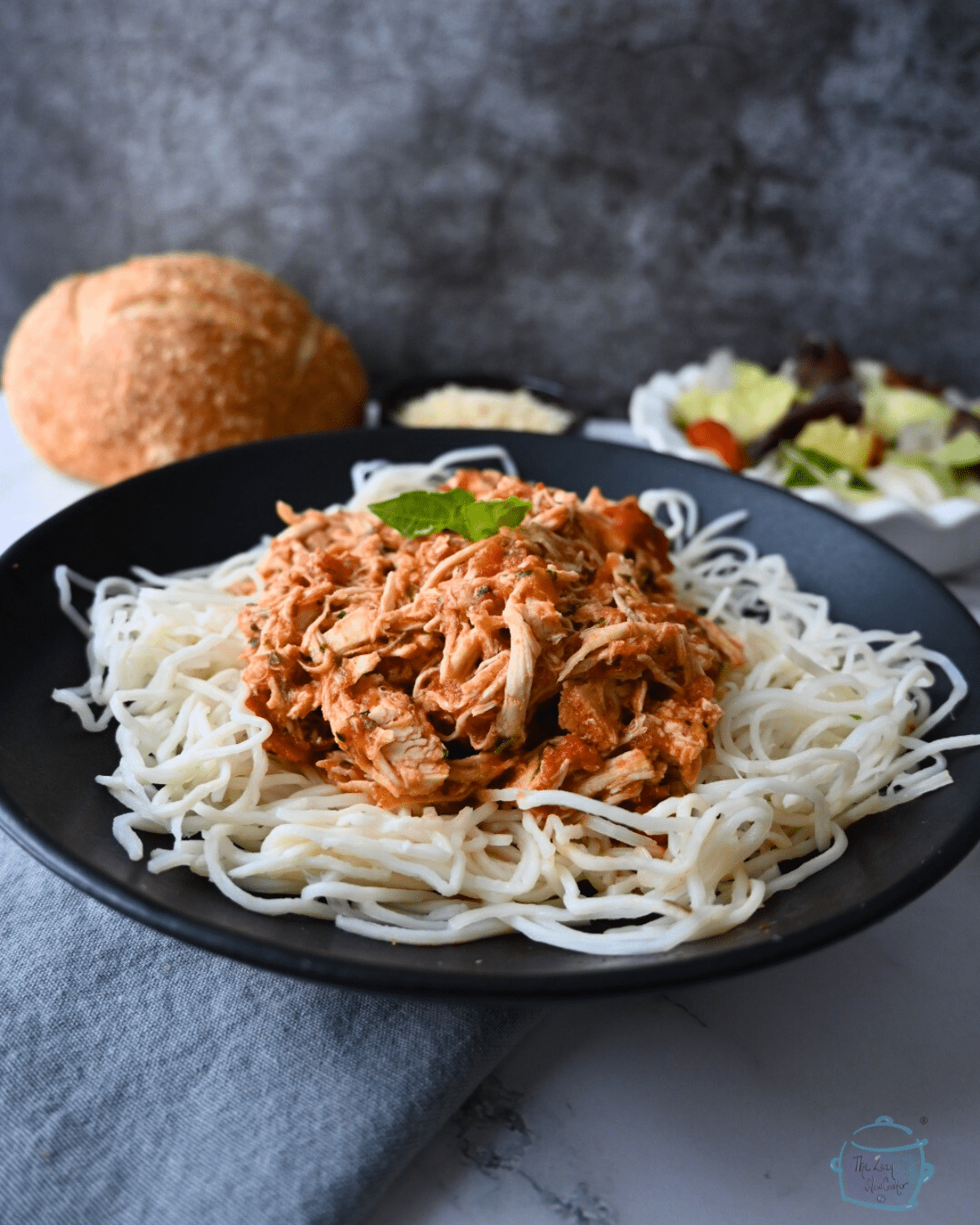 Slow Cooker Creamy Tomato Basil Shredded Chicken - The Lazy Slow Cooker